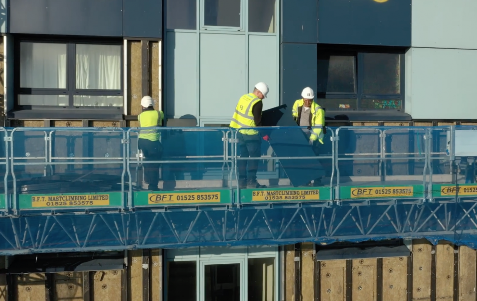 design build facades - Rainscreen Overcladding