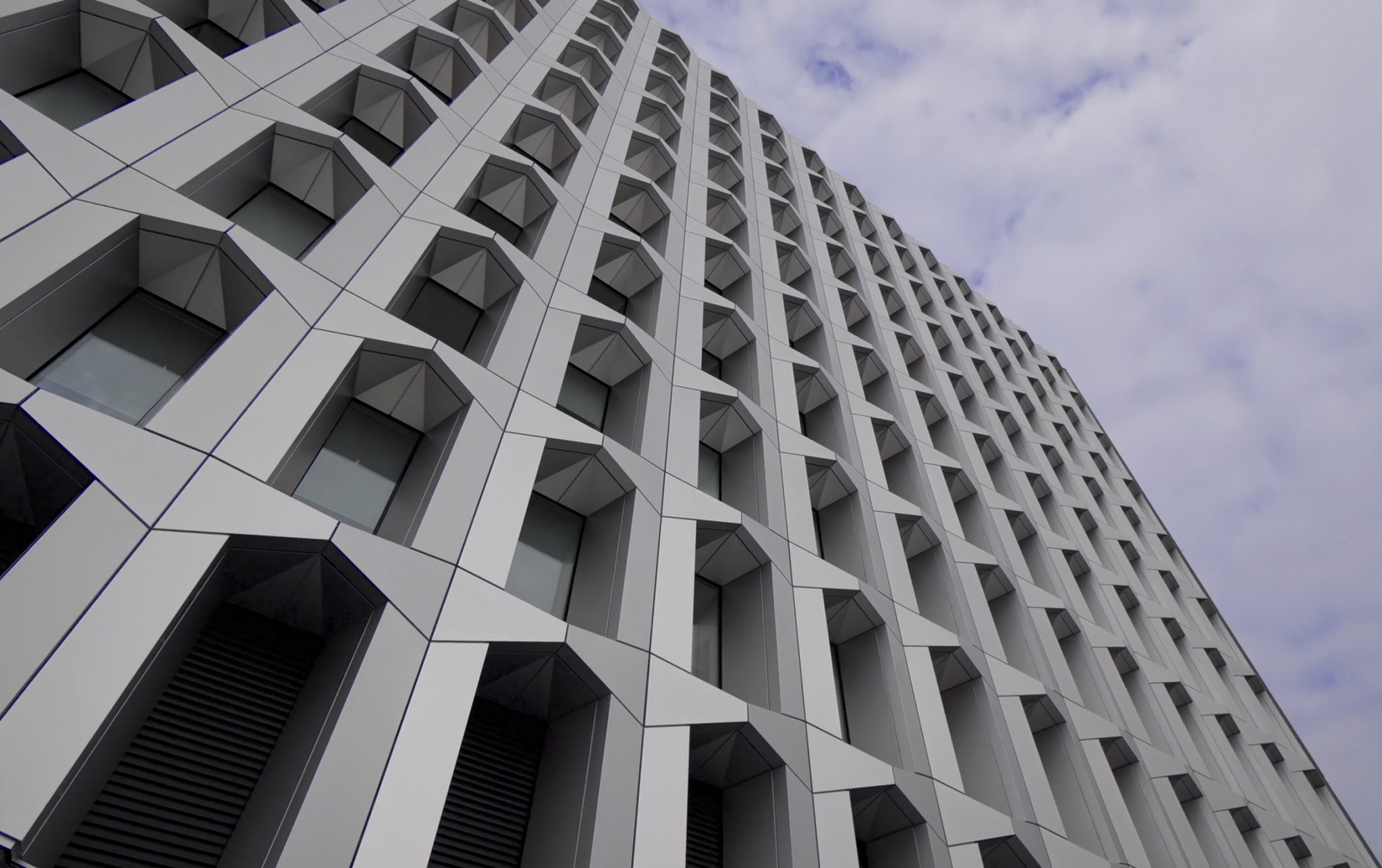 design build facades - Rainscreen Overcladding